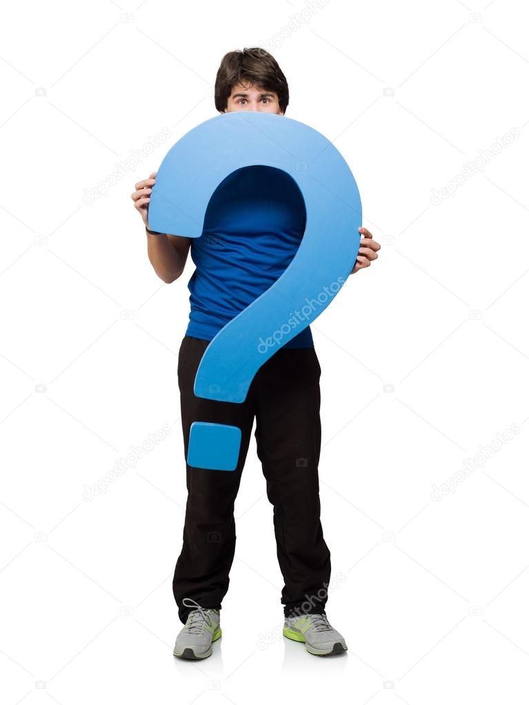 Young Man Holding Question Mark — Stock Photo © Krakenimages.com #23671453