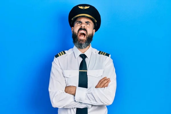 Young Hispanic Man Wearing Airplane Pilot Uniform Arms Crossed Gesture ...