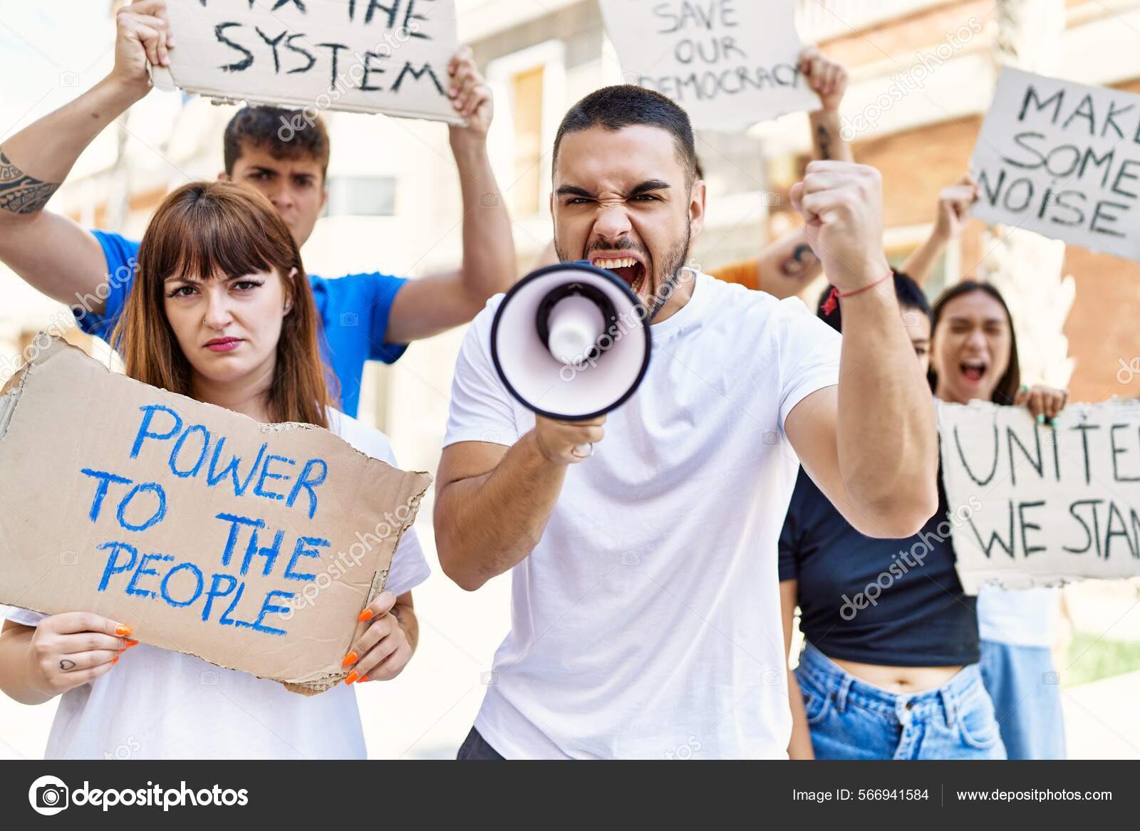 Group Young Activists Protesting Holding Banner Using Megaphone City ...