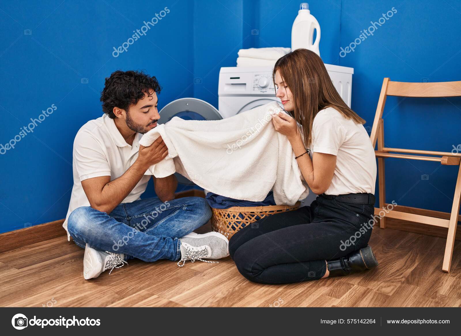 Man Woman Couple Smiling Confident Smelling Towel Laundry Room — Stock Photo © Krakenimages.com ...