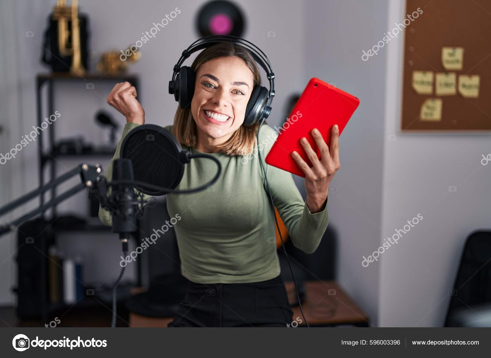 Hispanic Woman Singing Song Using Microphone Tablet Screaming Proud ...
