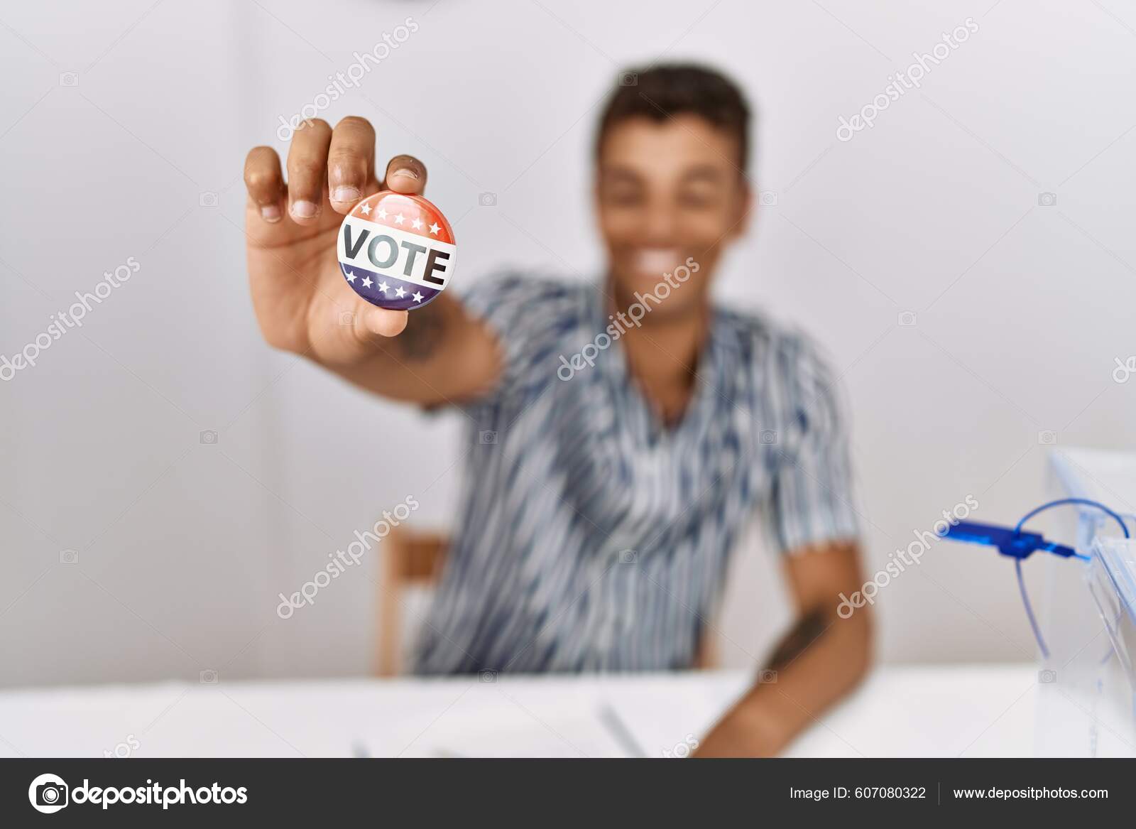 Young Hispanic Man Holding Vote Badge Election Room — Stock Photo ...
