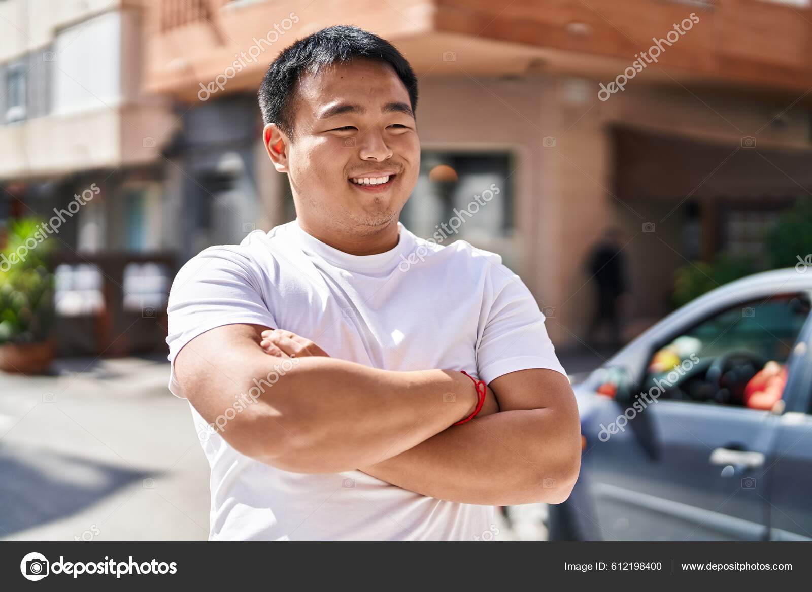 Young Chinese Man Smiling Confident Standing Arms Crossed Gesture ...