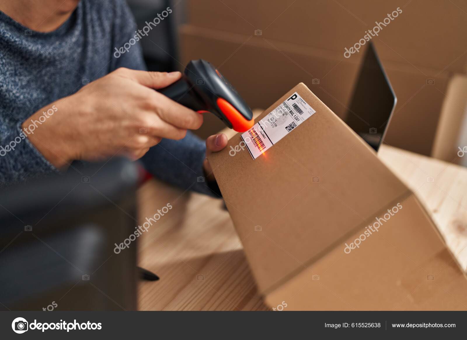 Young Hispanic Man Ecommerce Business Worker Scanning Package Office ...