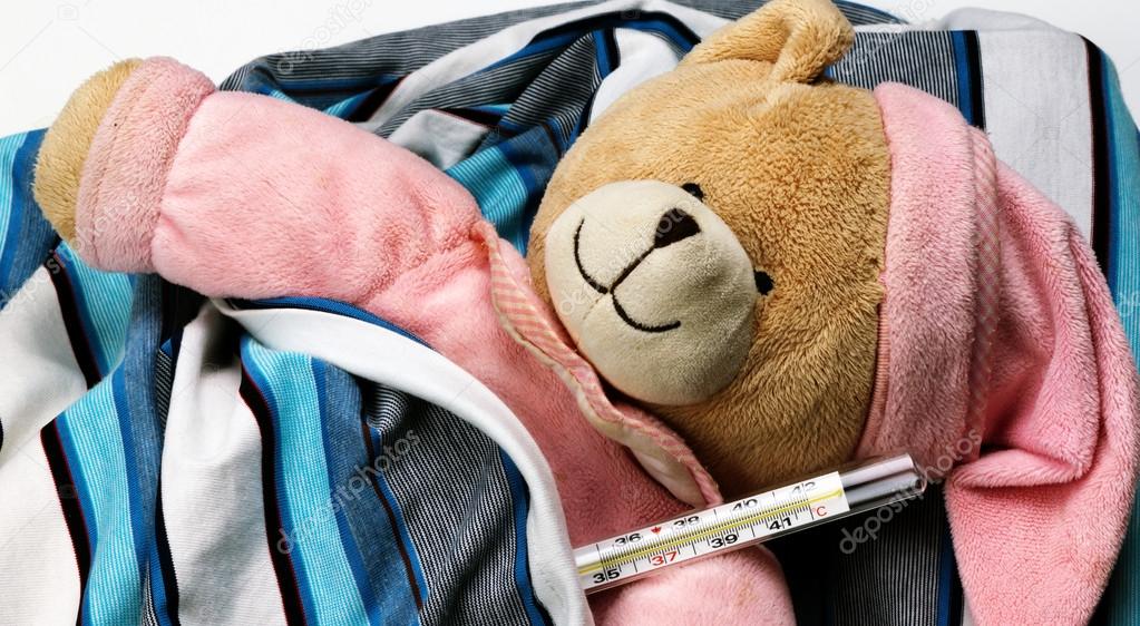 Toy bear is sick — Stock Photo © IvanRoo #18807157