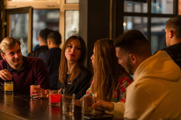 Two amazing and beautiful couples are talking with each other - Stock ...