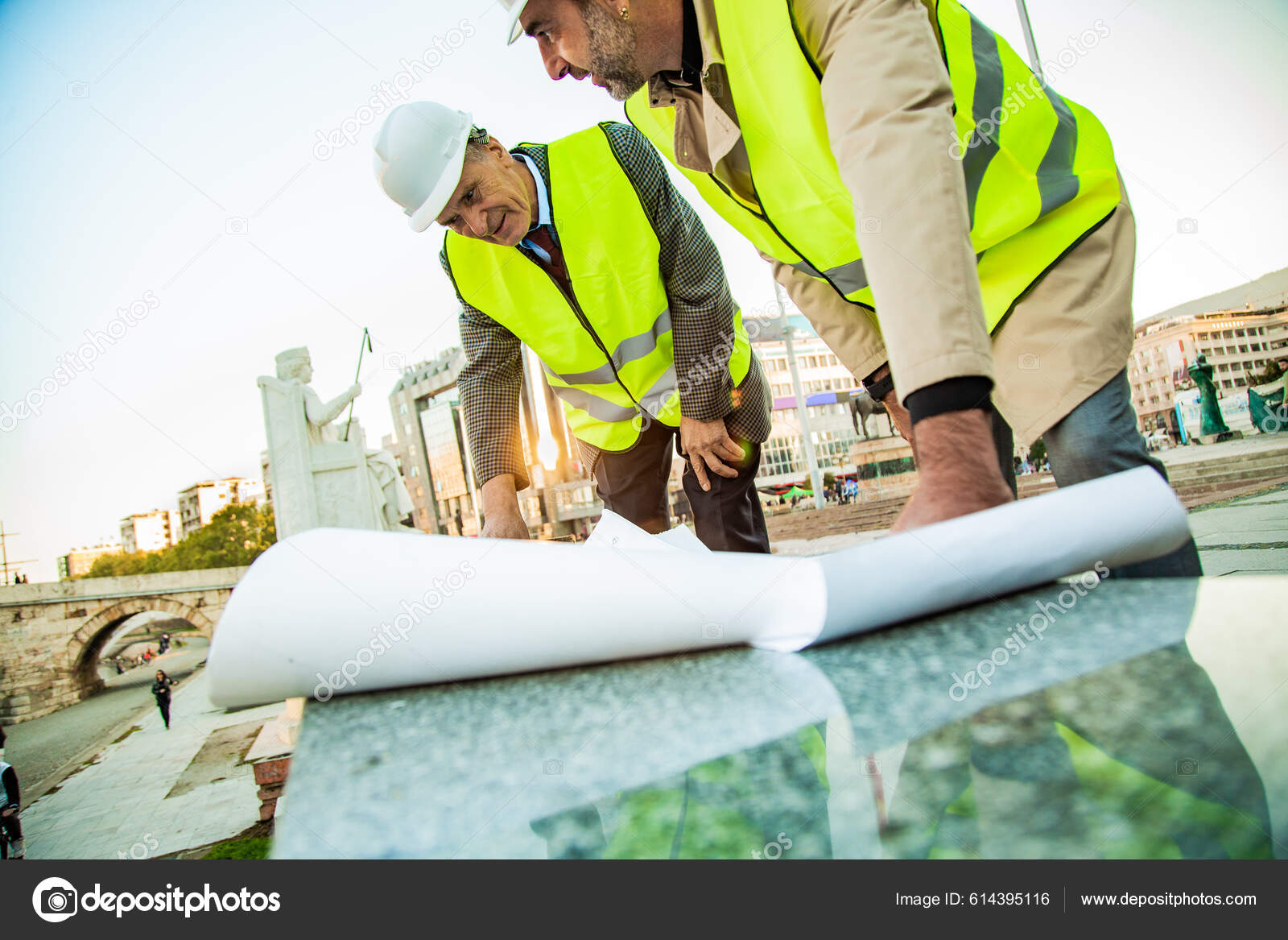 Two Construction Workers Smiling Looking New Plans Low Angel — Stock ...
