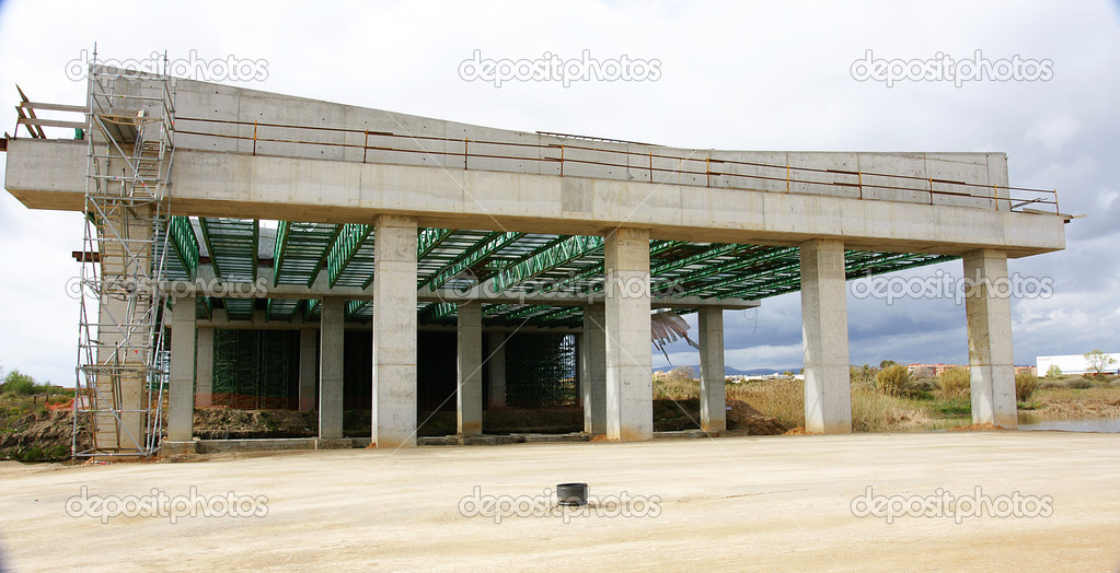 Columns and support beam in the construction of a bridge Stock Photo by ...