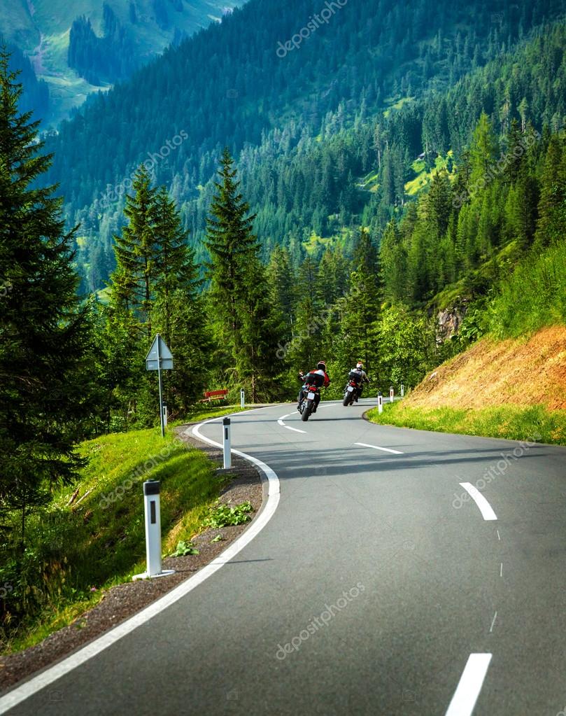 Group of motorcyclists in Alpine mountains Stock Photo by ©Anna_Om 31218089