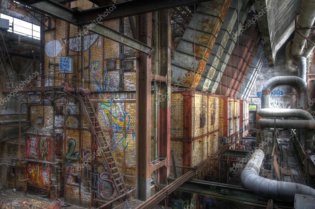 Old abandoned furnaces in a hall — Stock Photo © Stefan_90 #40978357