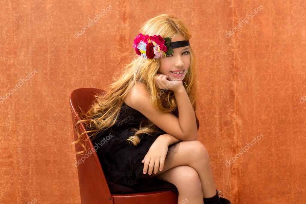 Blond fashin kid girl sitting on retro vintage seat Stock Photo by ...