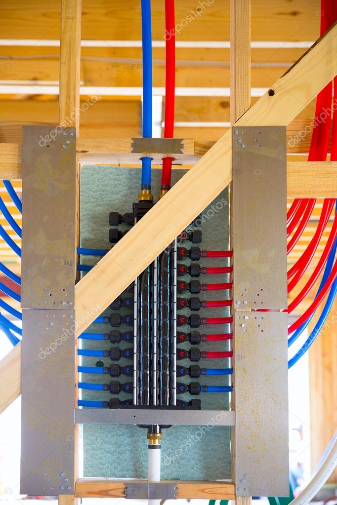 Plumbing manifold system PEX tubing Stock Photo by ©lunamarina 26184641