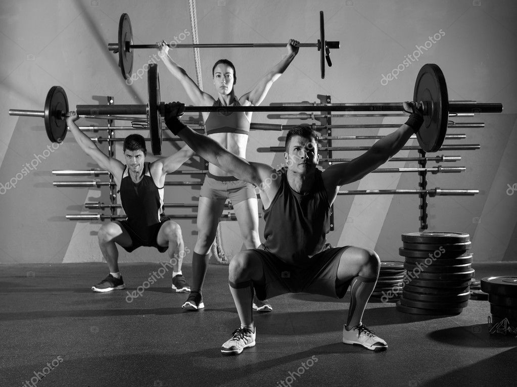 Barbell weight lifting group workout exercise gym Stock Photo by ...