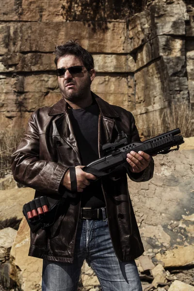 Crazy man holding a gun — Stock Photo © Krakenimages.com #16298527