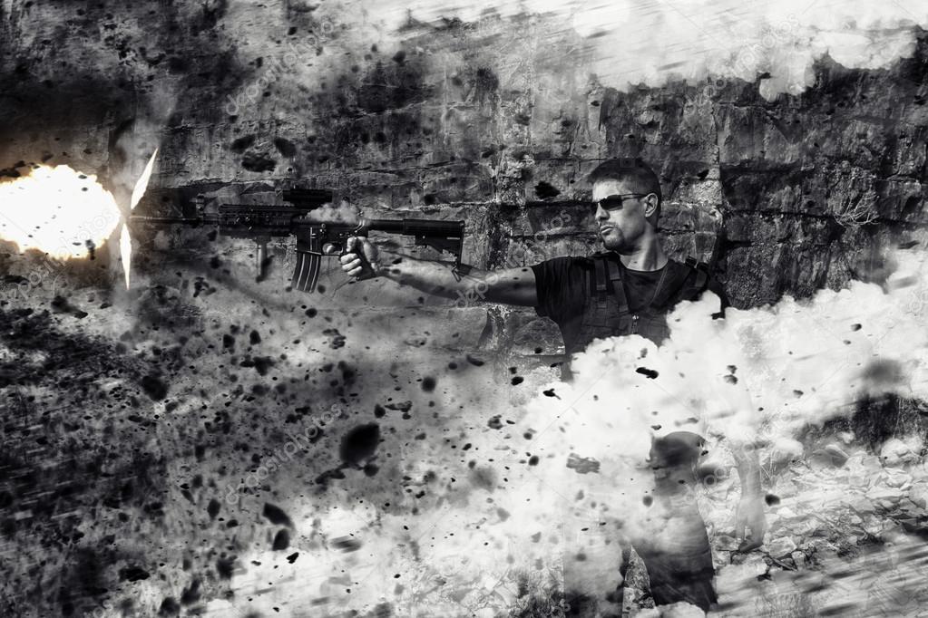 Menacing man firing a machine gun Stock Photo by ©membio 19378441