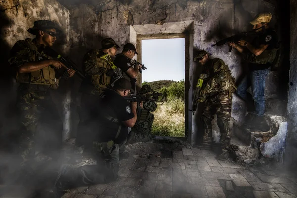 Large Airsoft group team posing in action - Stock Image - Everypixel