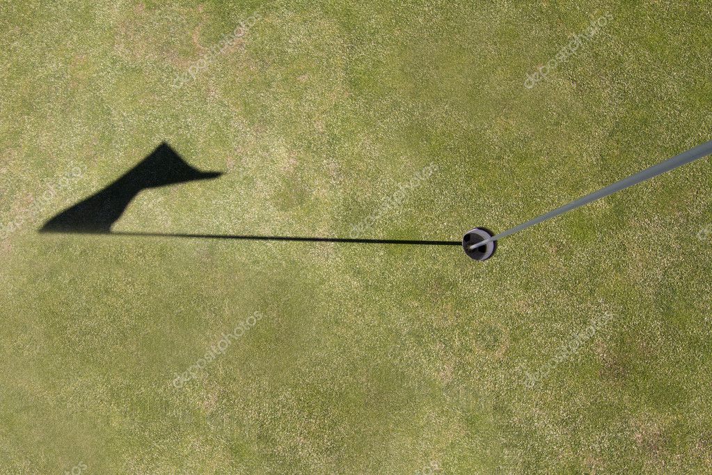 Flag golf hole view on a golf course — Stock Photo © membio #50800583
