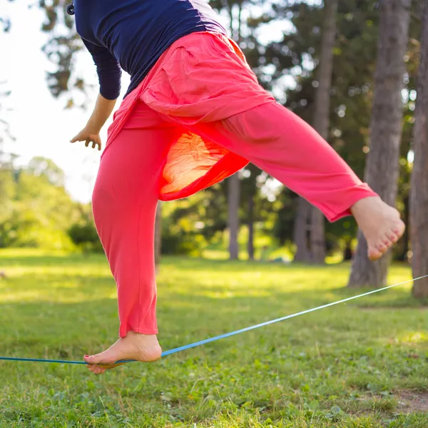 Slack line in the city park. — Stock Photo © kasto #51939285
