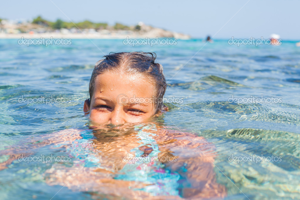 Young girl in the sea Stock Photo by ©mac_sim 19150495