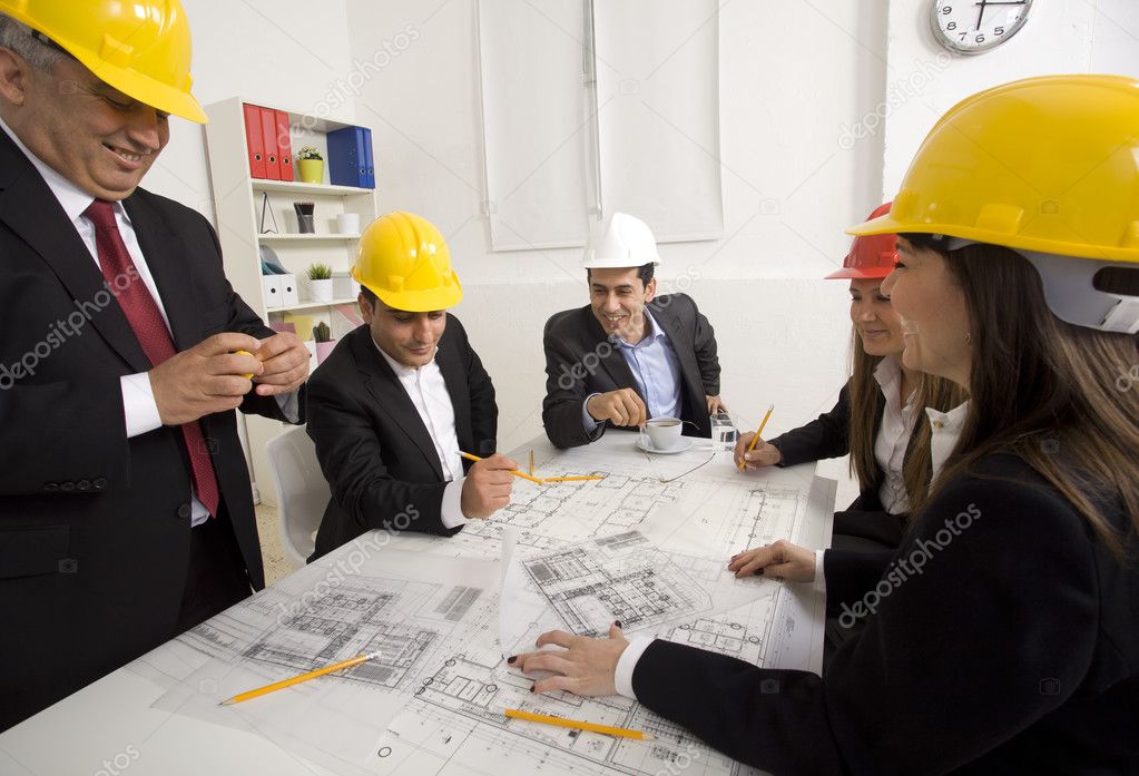 Architects working in office on construction project — Stock Photo ...