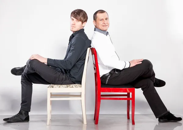 Two men sitting Stock Photos, Royalty Free Two men sitting Images ...