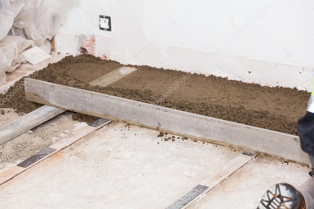 Preparing a cement screed Stock Photo by ©Chretien 29679531