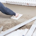 Mason smooth the cement screed Stock Photo by ©Chretien 23936645