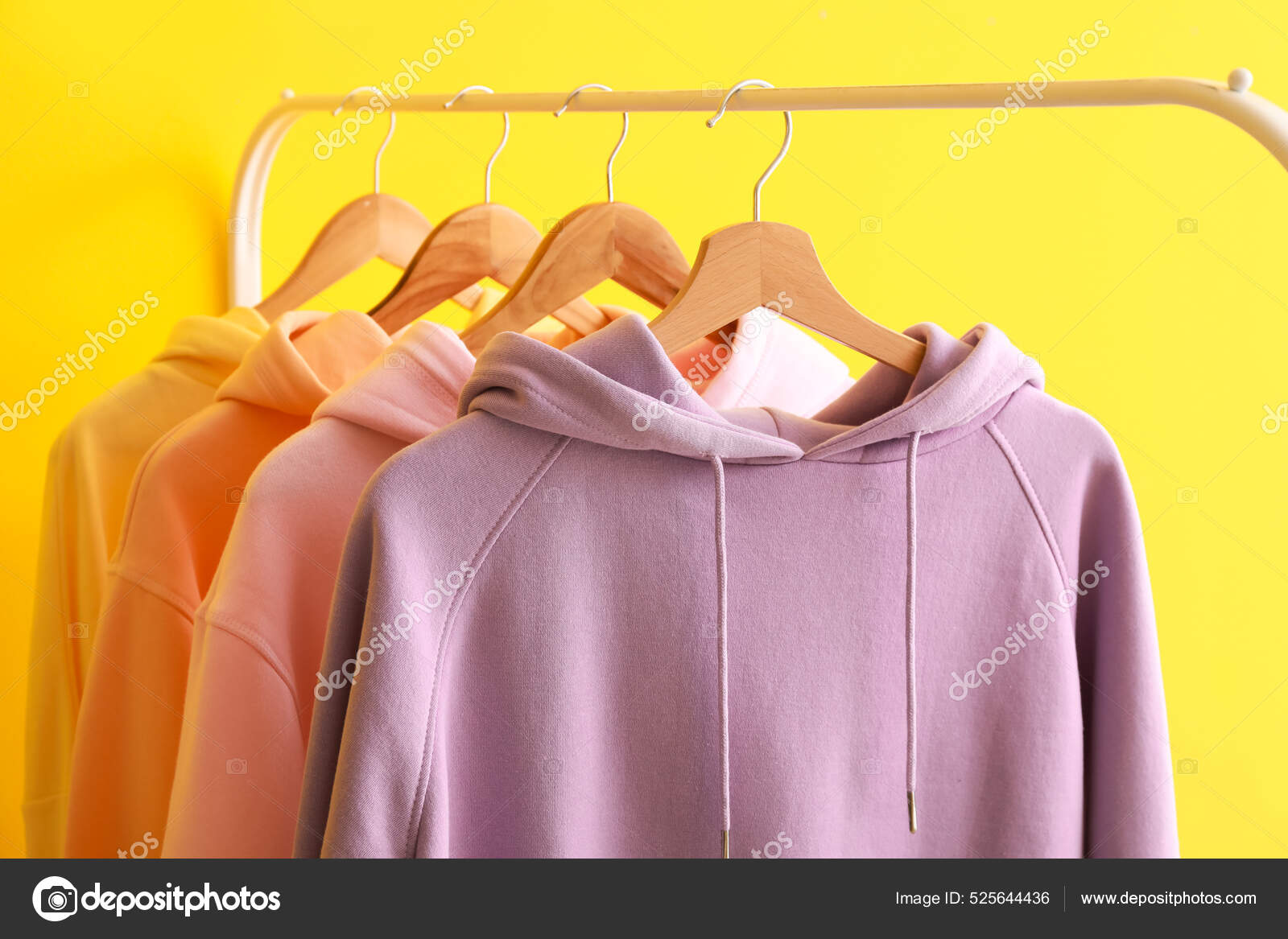 Rack Modern Hoodies Color Background Stock Photo by ©serezniy 525644436