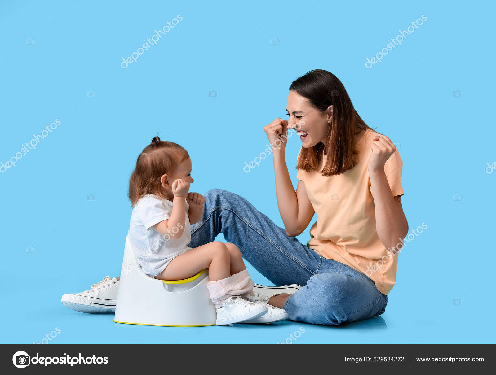 Mother Potty Training Her Little Daughter Color Background Stock Photo ...