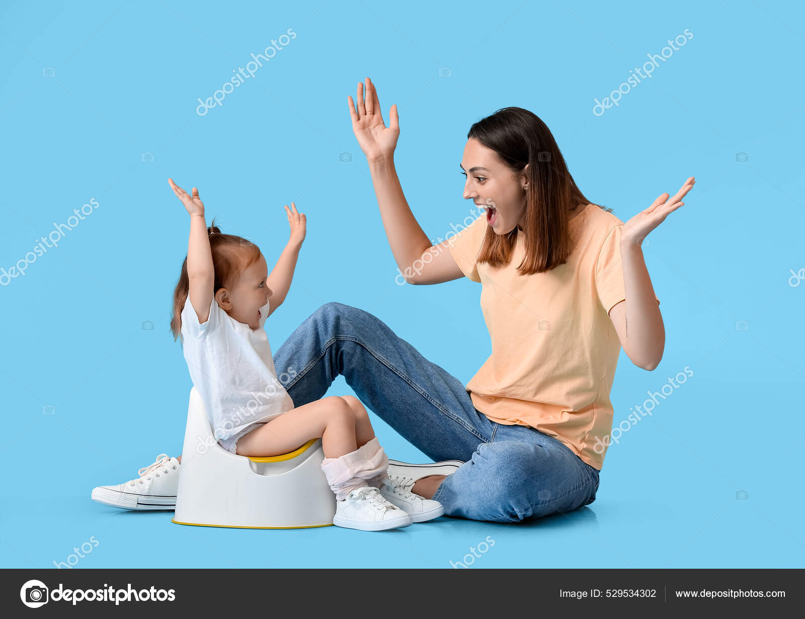 Mother Potty Training Her Little Daughter Color Background Stock Photo ...