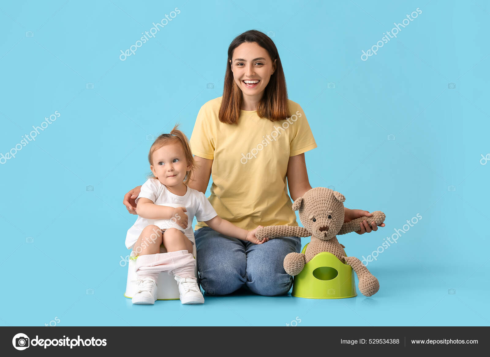 Mother Potty Training Her Little Daughter Color Background Stock Photo ...