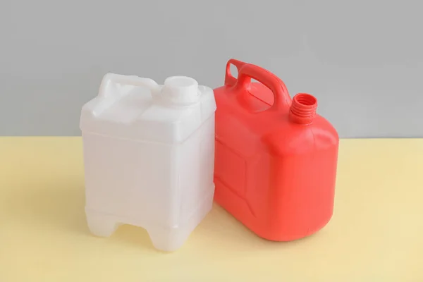 Plastic Jerrycan Color Background Stock Photo by ©serezniy 535017660