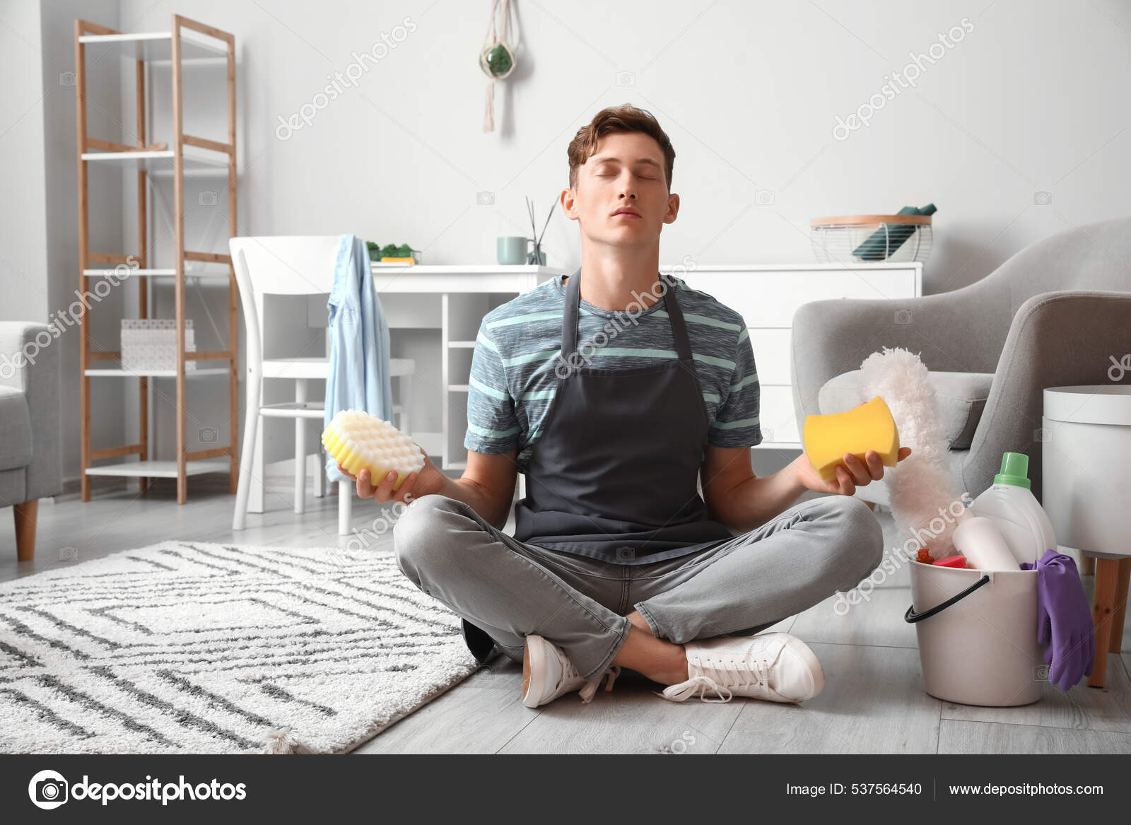 Handsome Man Different Cleaning Sponges Meditating Home Stock Photo by ...