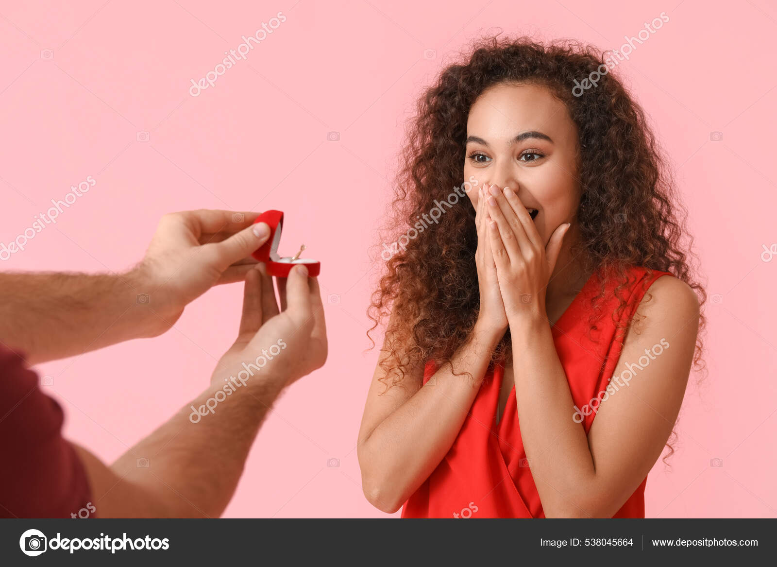 Young Man Proposing His Surprised Girlfriend Color Background Stock ...