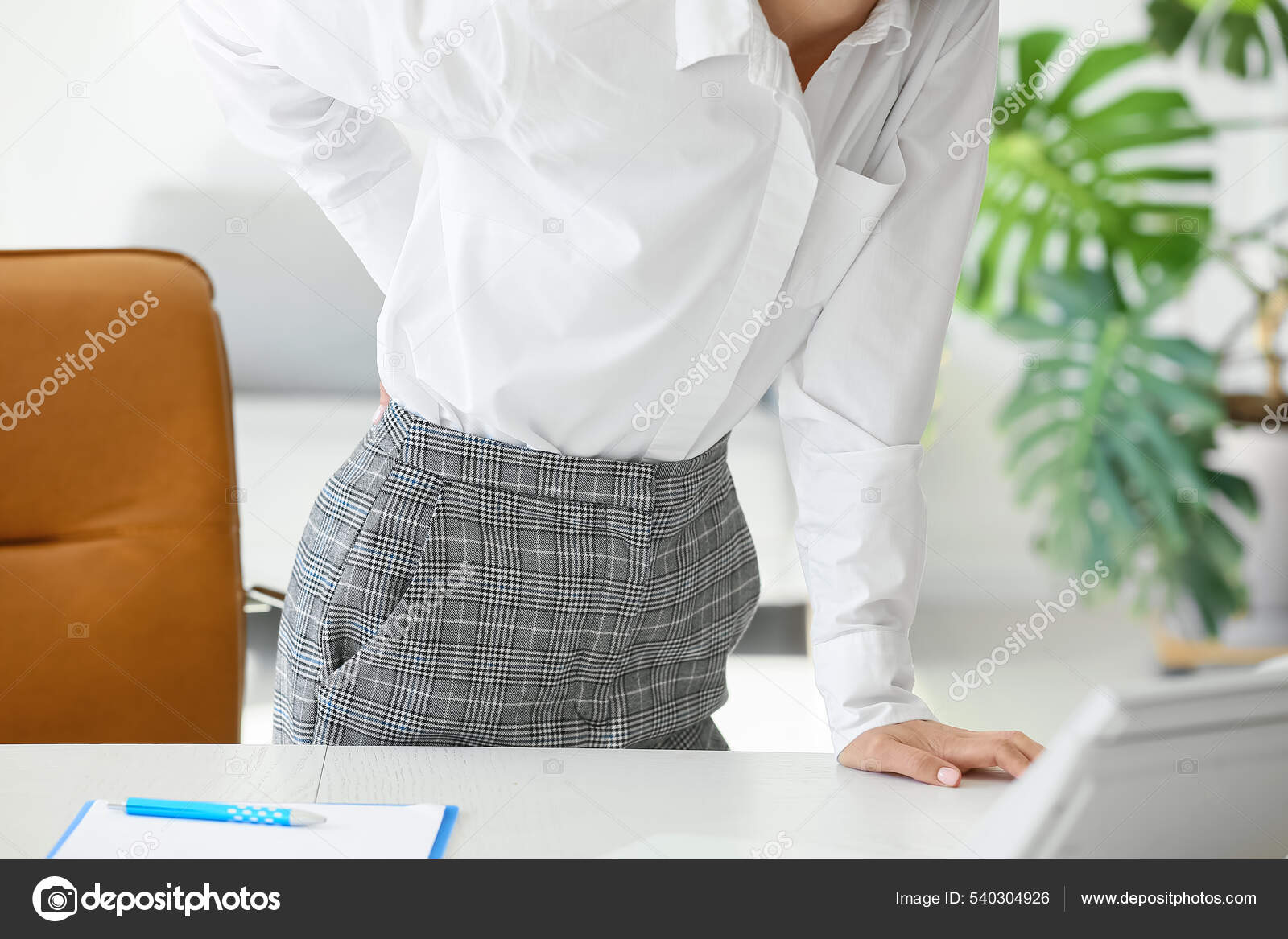 Young Woman Feeling Back Pain Office — Stock Photo © serezniy #540304926