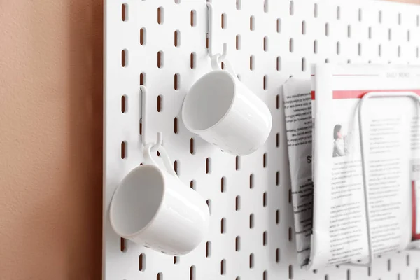 Pegboard Cups Kitchen Utensils Wall Stock Photo by ©serezniy 543534506