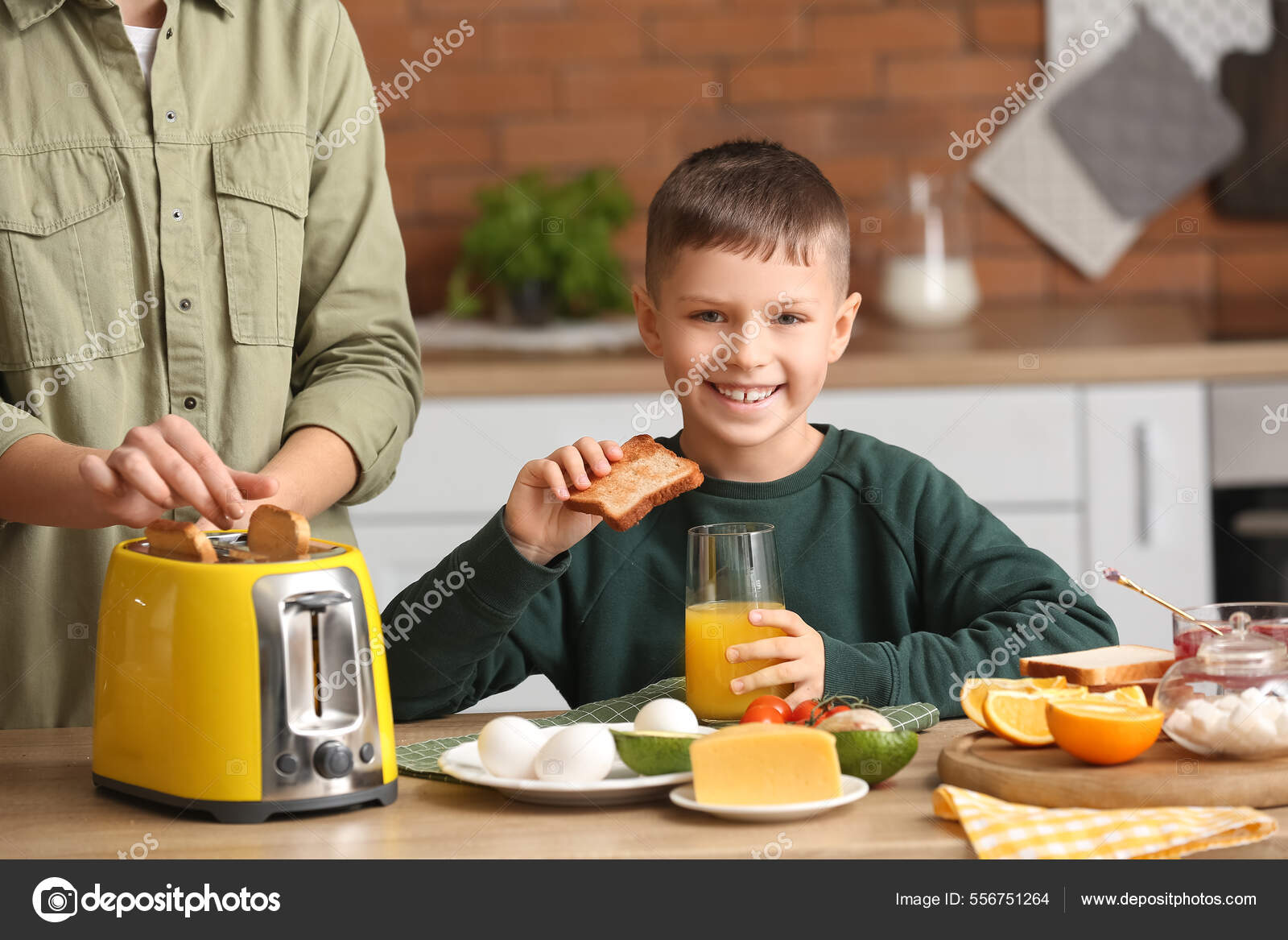 Little Boy Toasted Bread Slice Glass Juice His Mother Kitchen Stock ...