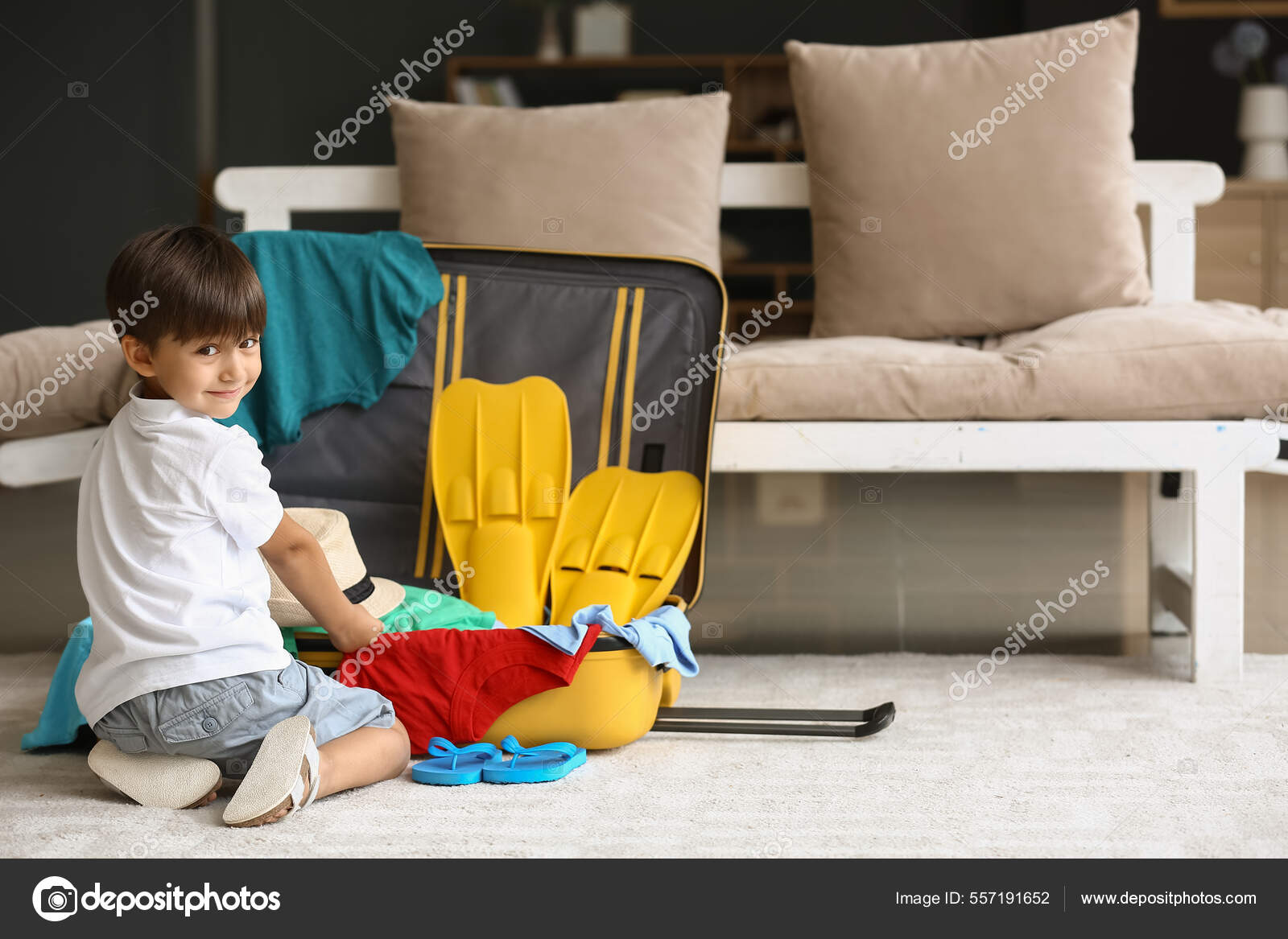 Little Boy Packing Suitcase Home Stock Photo by ©serezniy 557191652