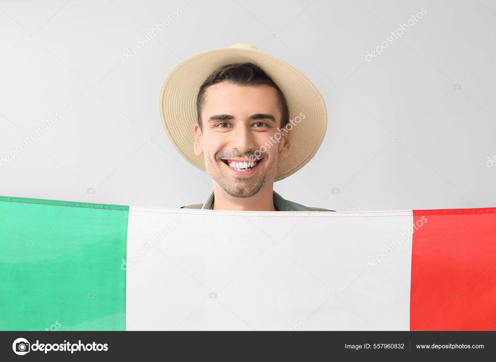 Young Man Italian Flag Light Background — Stock Photo © serezniy #557960832