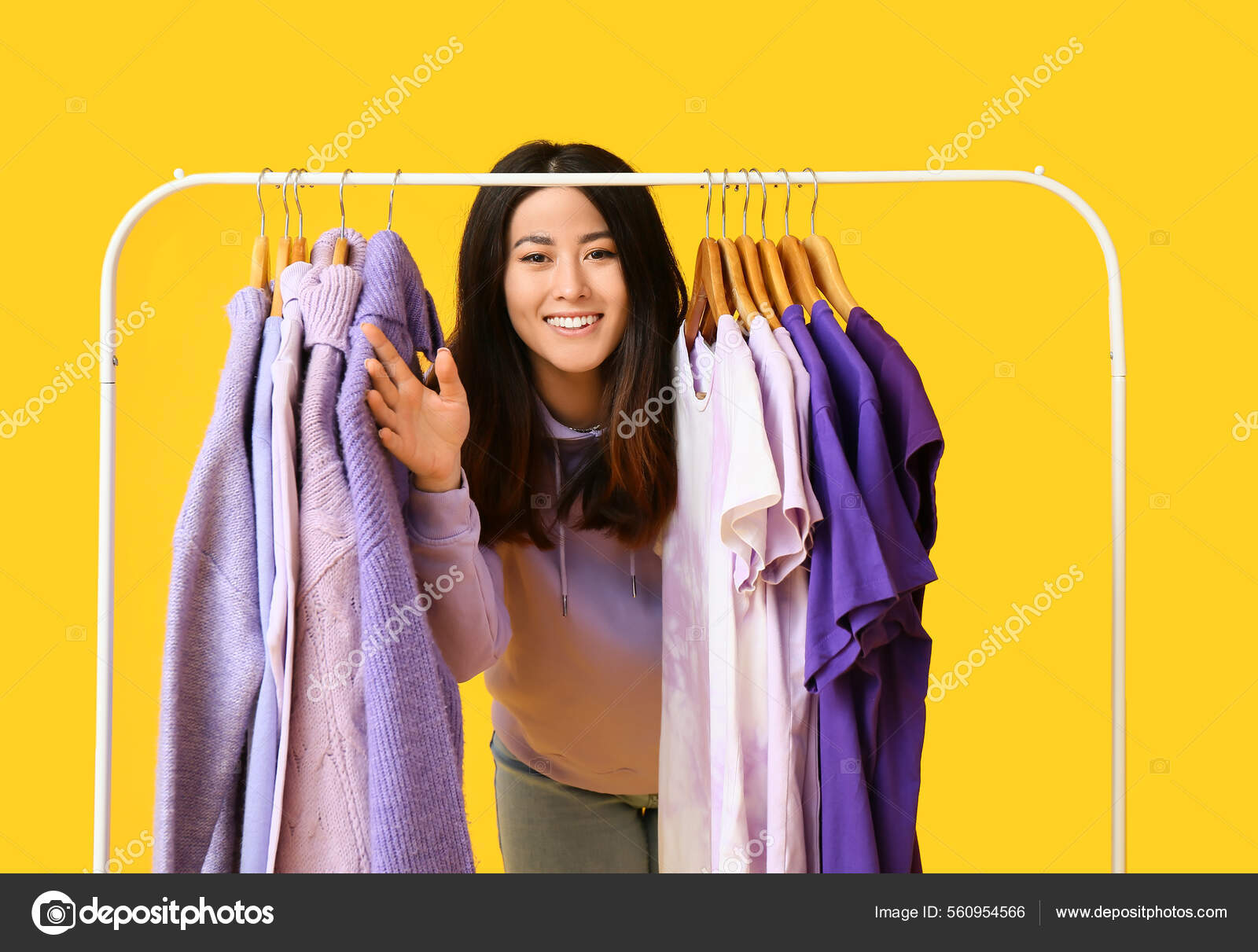 Young Asian Woman Rack Clothes Purple Shades Yellow Background Stock ...