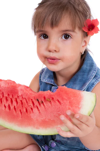 Adorable girl eating watermelon Stock Photo by ©Gelpi 9436335