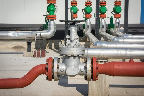 Oil and gas pipe line valves Stock Photo by ©zorandim 115422282