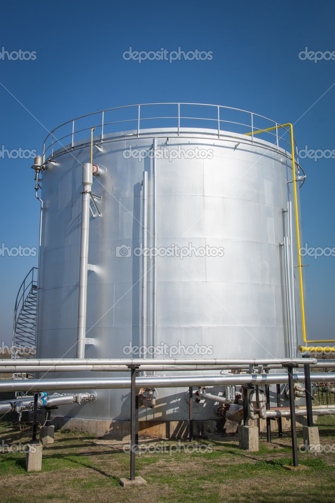 Oil storage and pipeline Stock Photo by ©zorandim 33479553
