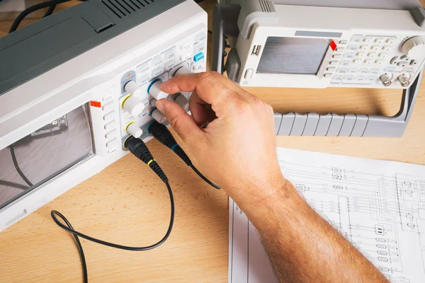 Tech tests electronic equipment in service - Stock Image - Everypixel