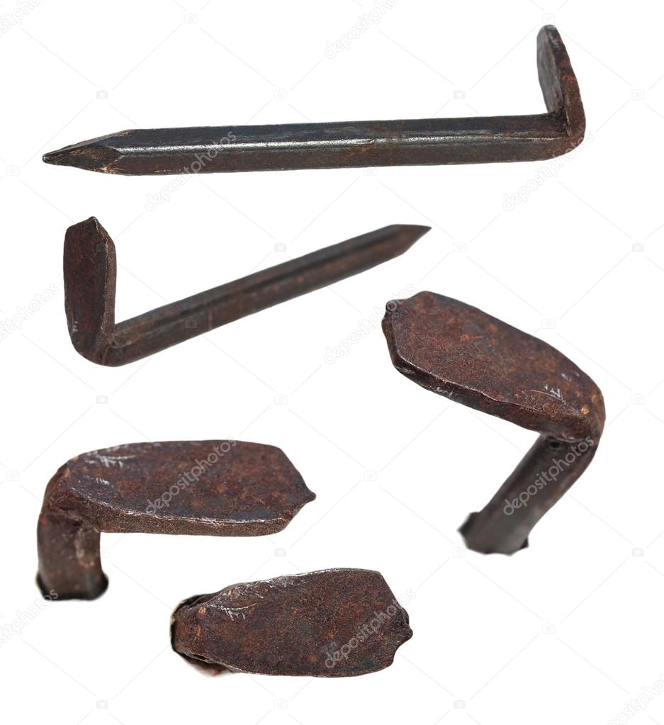 Old railroad spike isolated on white background Stock Photo by ...