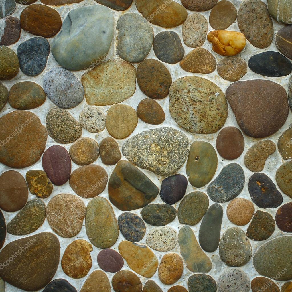 Wall round stone rock texture Stock Photo by ©liewluck 21471917