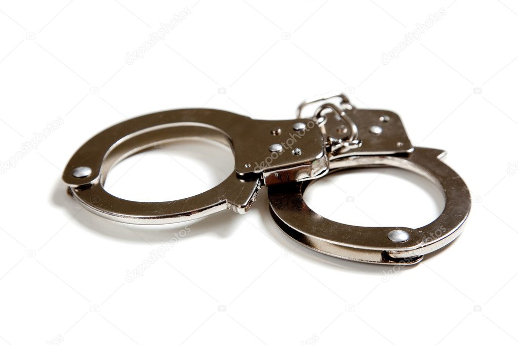 A set of handcuffs on white Stock Photo by ©miflippo 13443467