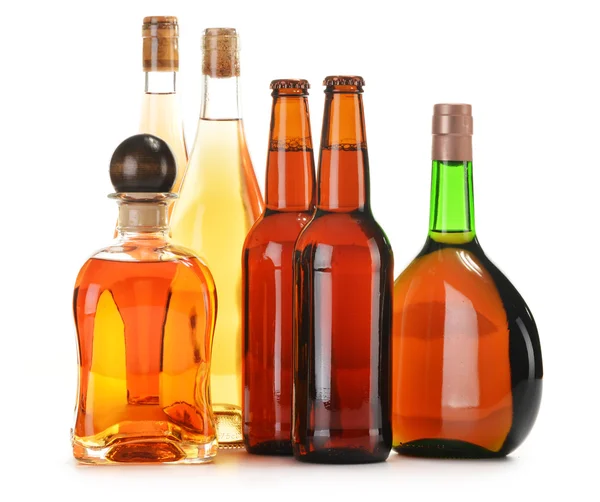 Composition with bottles of assorted alcoholic products isolated ...