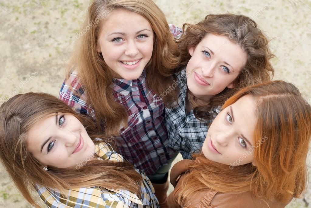 Four happy teen girls friends — Stock Photo © rosipro #18246735 Four happy teen girls friends — Stock Photo © rosipro #18246735
