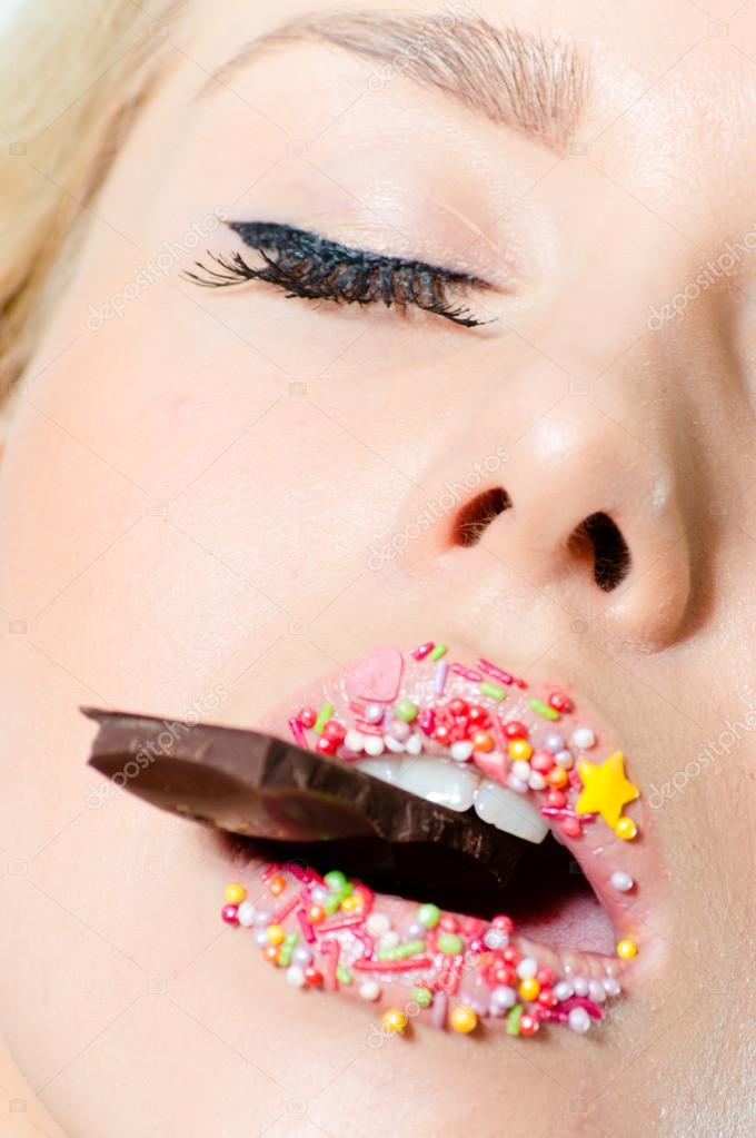 Sweet lips and chocolate bar — Stock Photo © rosipro #25339873